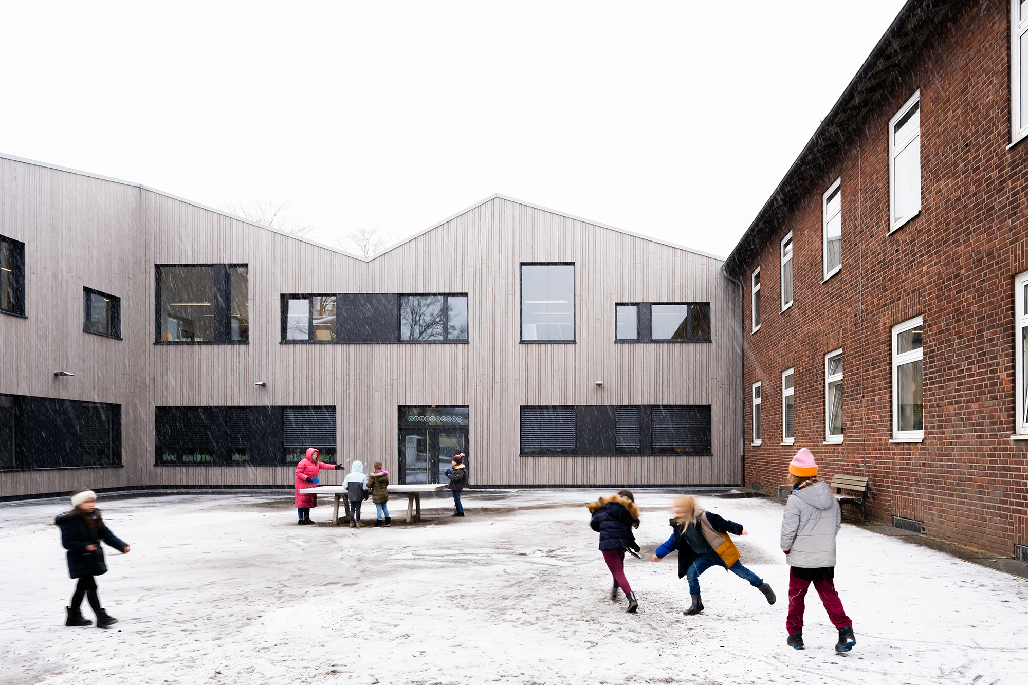 Renovation and new timber buildings at a primary school in Essen ...
